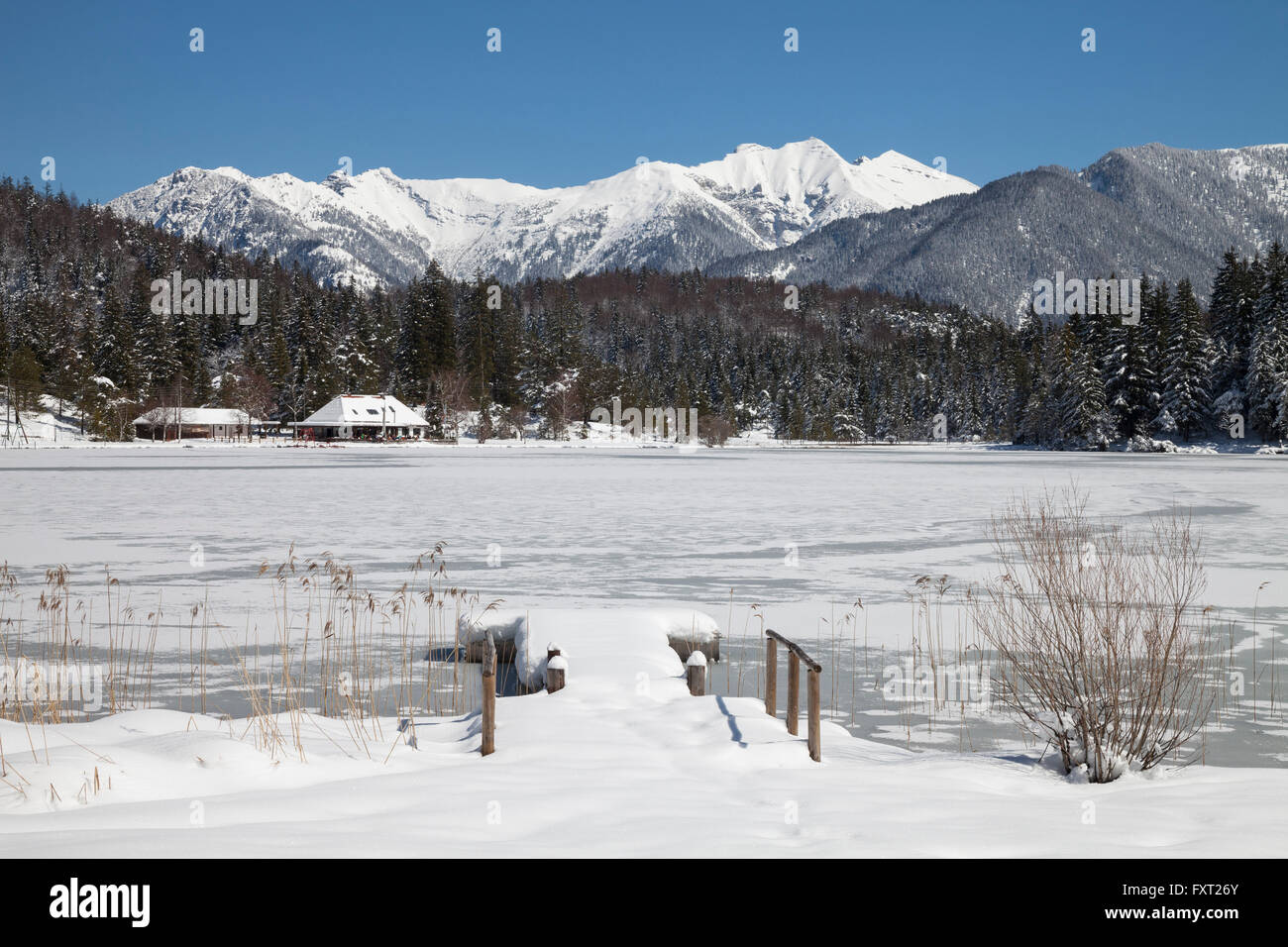 Frozen lake Lautersee in front of Karwendel Mountains, near Mittenwald ...