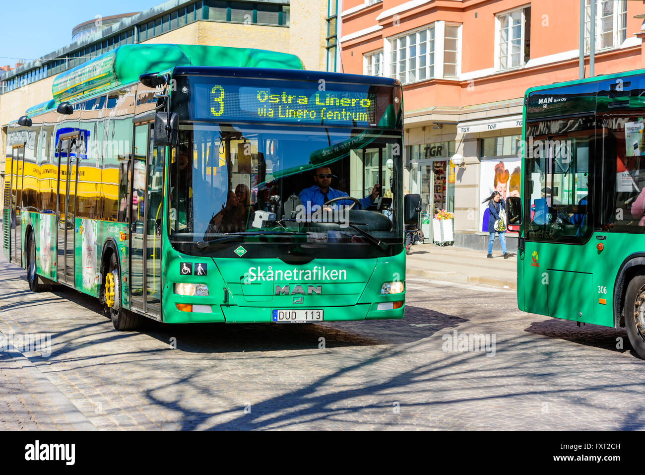 Lund, Sweden - April 11, 2016: Everyday life in the city. A bus drives ...