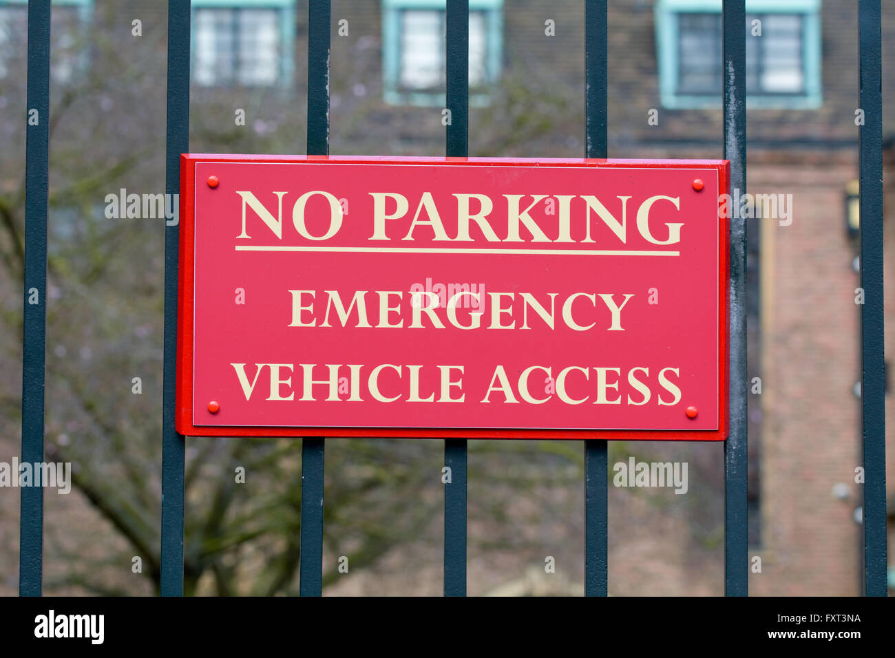 No Parking - Emergency Vehicle Access sign on gate Stock Photo - Alamy
