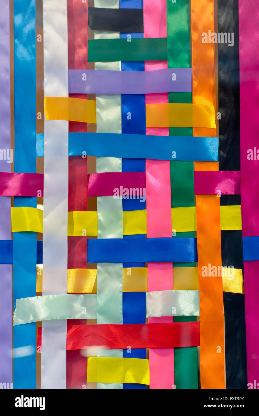 Vibrantly coloured ribbon in weave pattern Stock Photo - Alamy