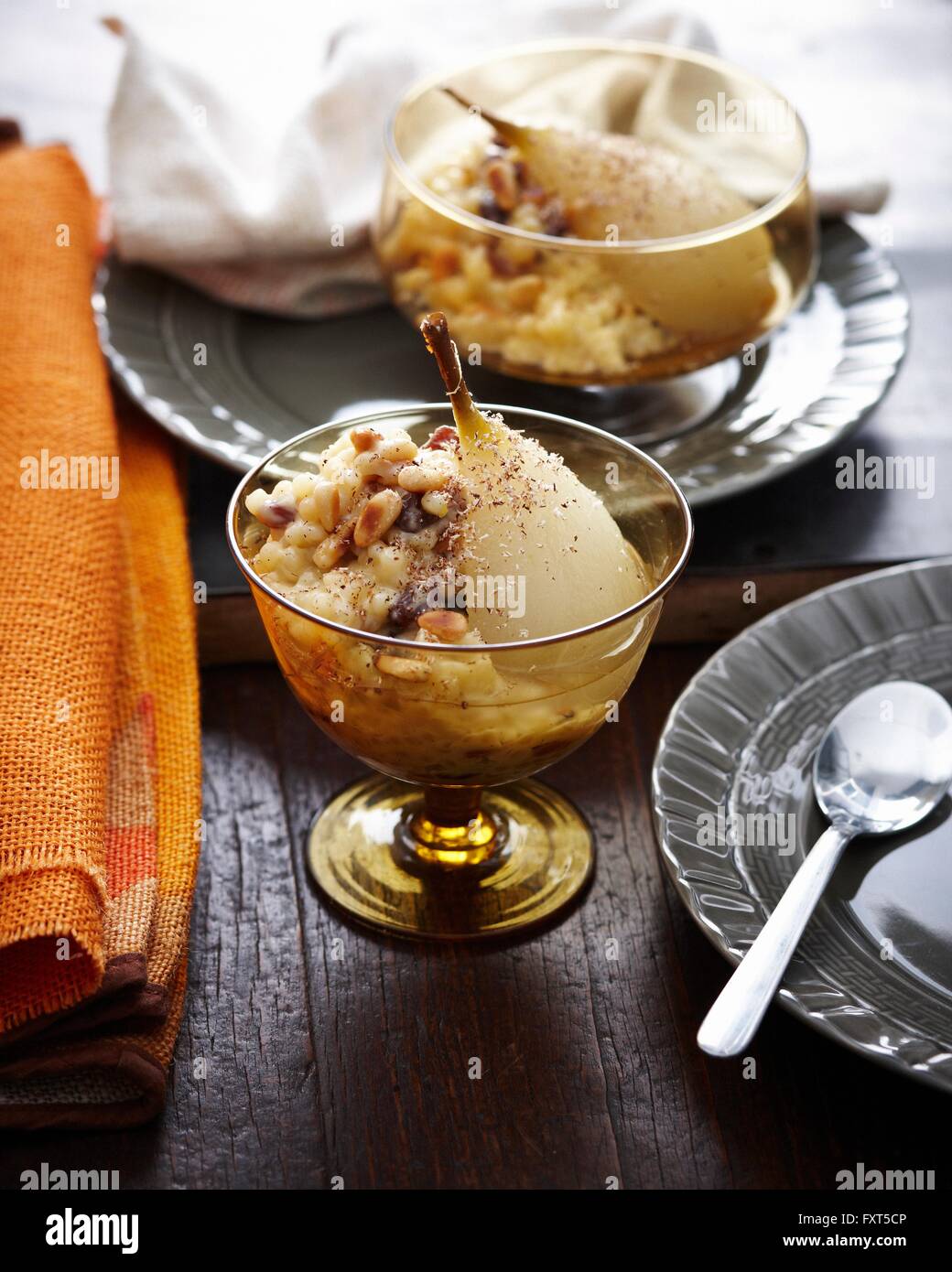 Table with dessert dishes of fregola pudding Stock Photo - Alamy