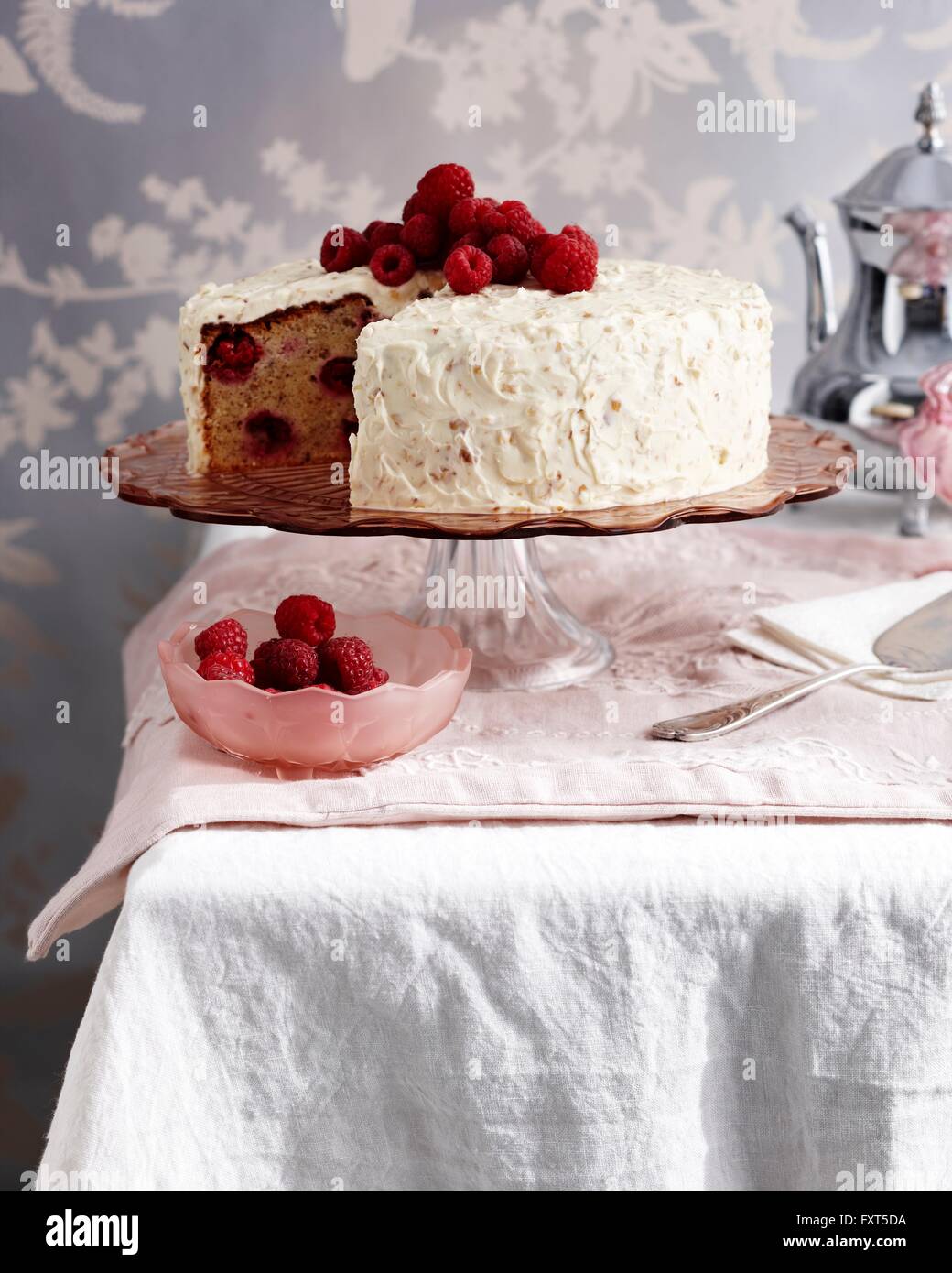 Raspberry hazelnut cake on traditional tea table Stock Photo - Alamy