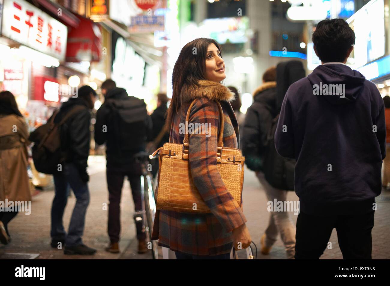 Woman looking in handbag hi-res stock photography and images - Alamy