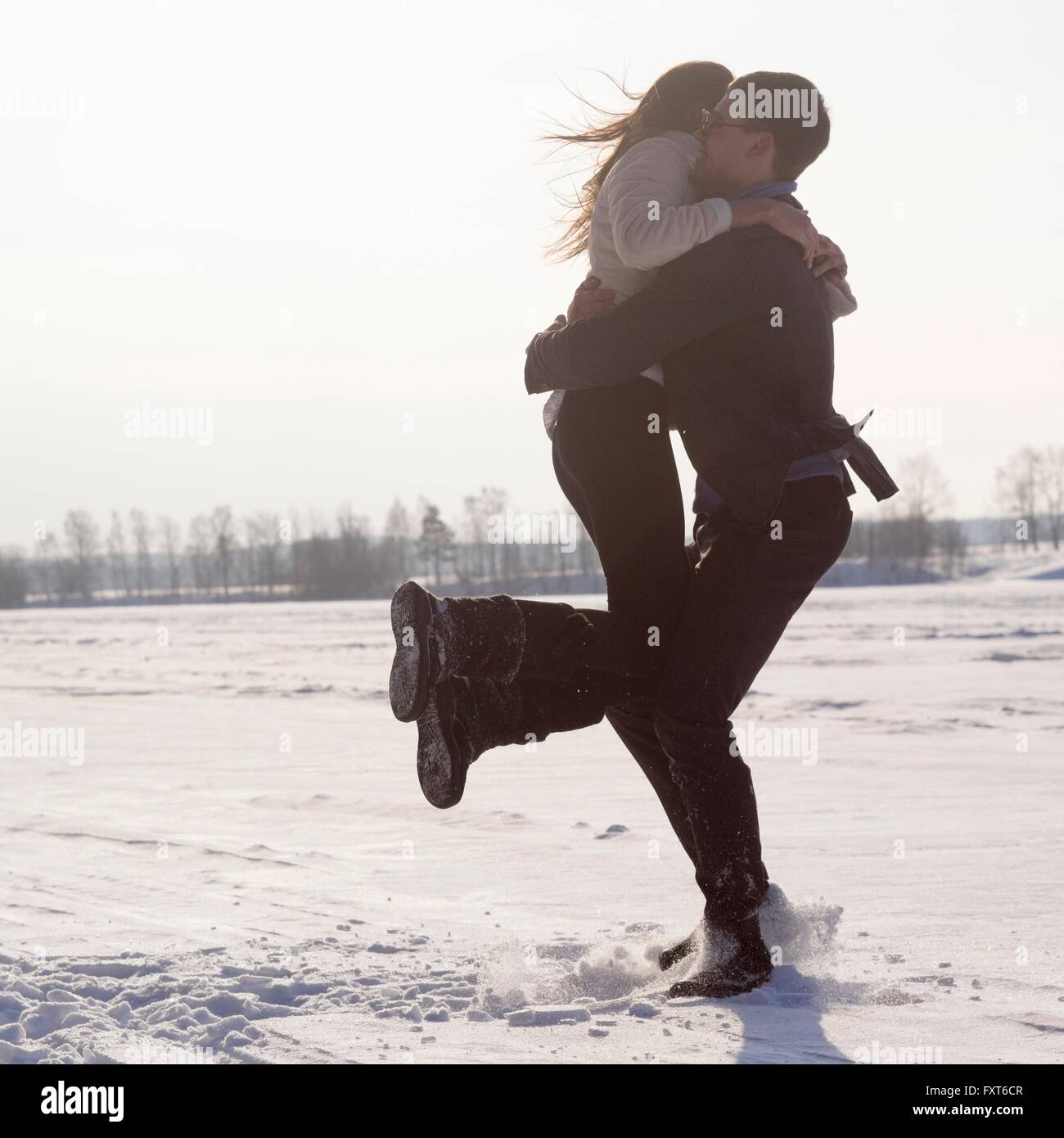 Man carrying woman hi-res stock photography and images - Alamy