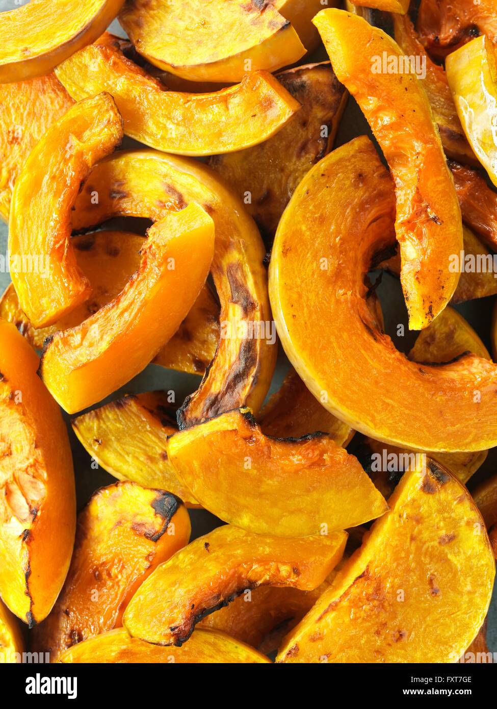 Butternut squash, sliced and roasted Stock Photo - Alamy