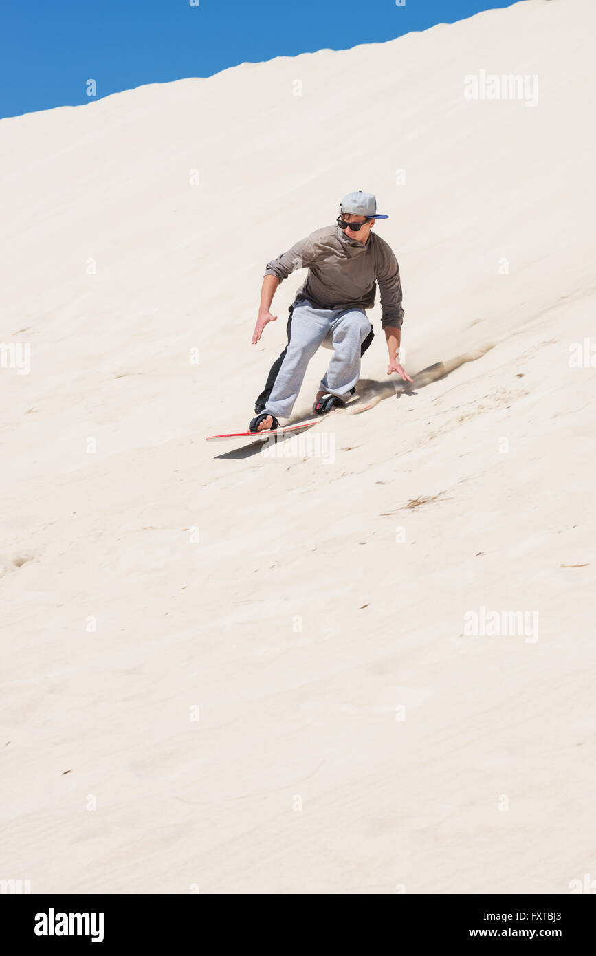 Sandboarding at sand dunes in Little Sahara, Kangaroo Island, South ...