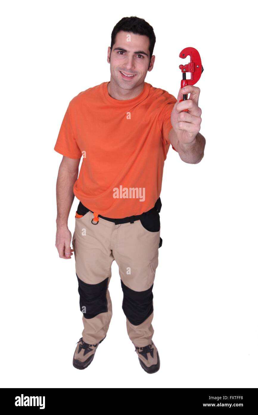 Man holding a tool Stock Photo - Alamy