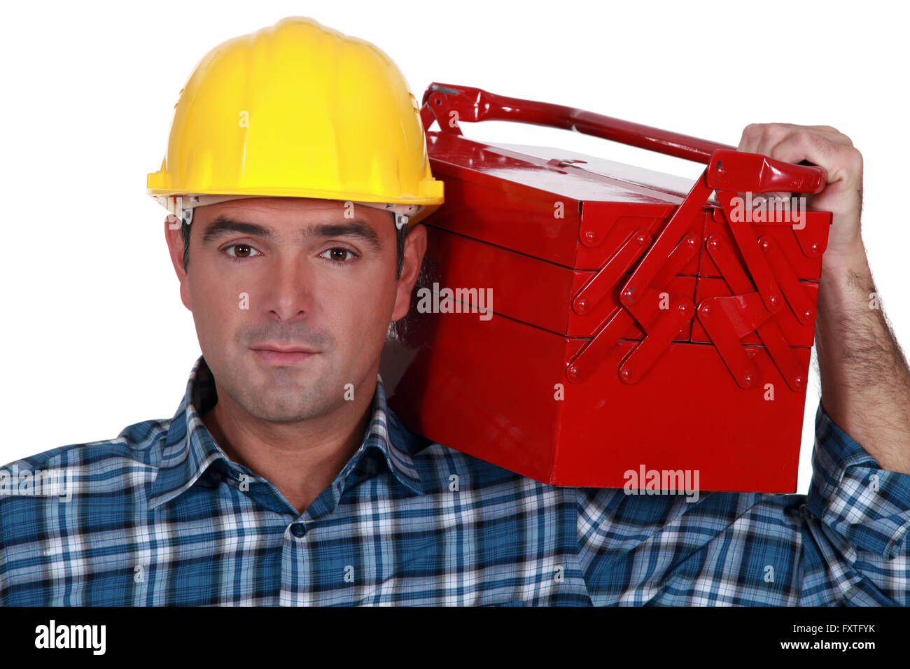workman carrying toolbox Stock Photo - Alamy