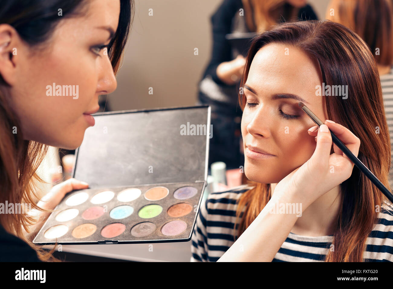 Make up process hi-res stock photography and images - Alamy