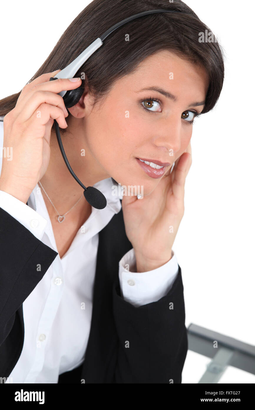 Woman wearing a headset Stock Photo - Alamy
