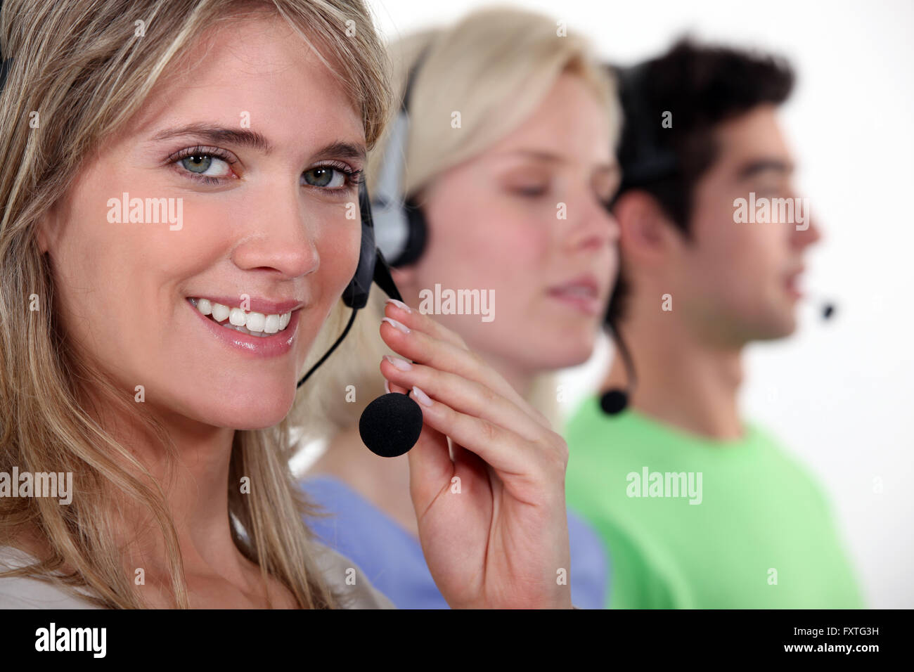 Young call-center workers Stock Photo - Alamy