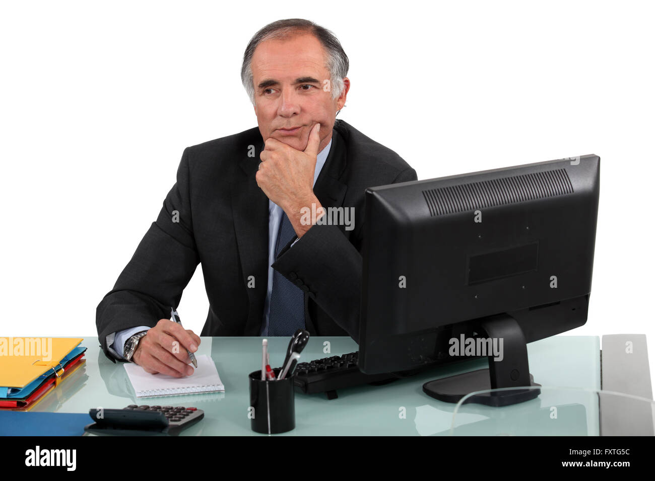 Pensive senior businessman has to make difficult decision Stock Photo ...