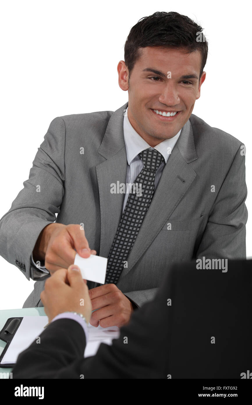Handing over business card hi-res stock photography and images - Alamy