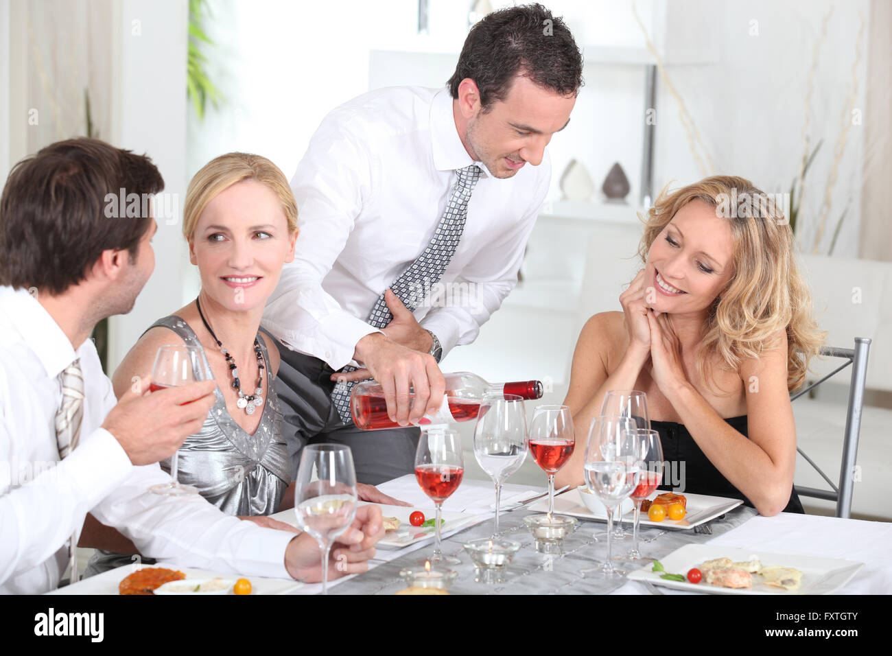 Couples having dinner at home hi-res stock photography and images - Alamy