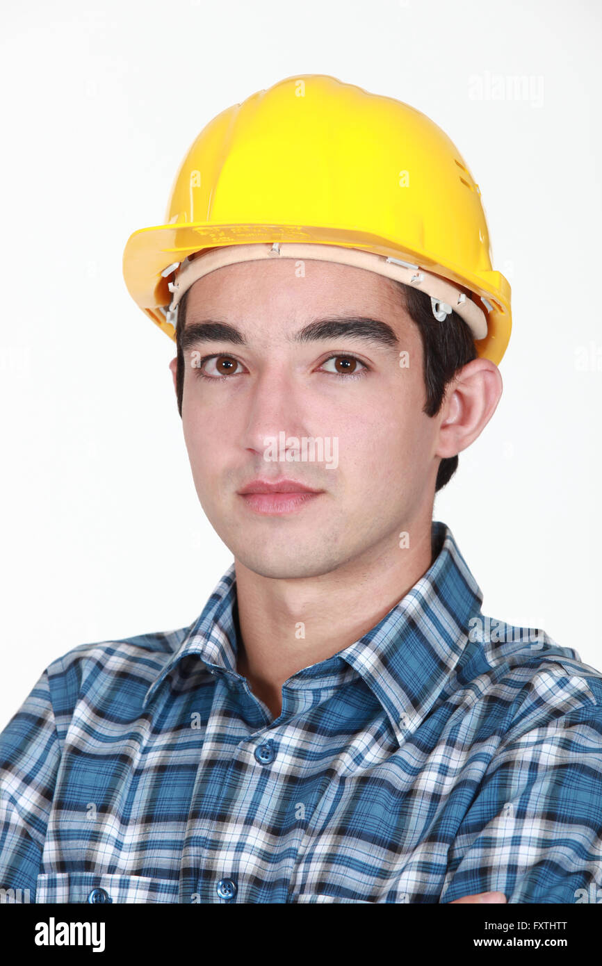 Young male builder Stock Photo - Alamy