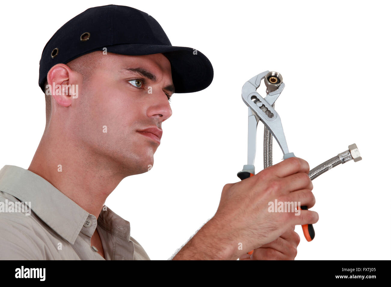 Worker with wrench Stock Photo - Alamy