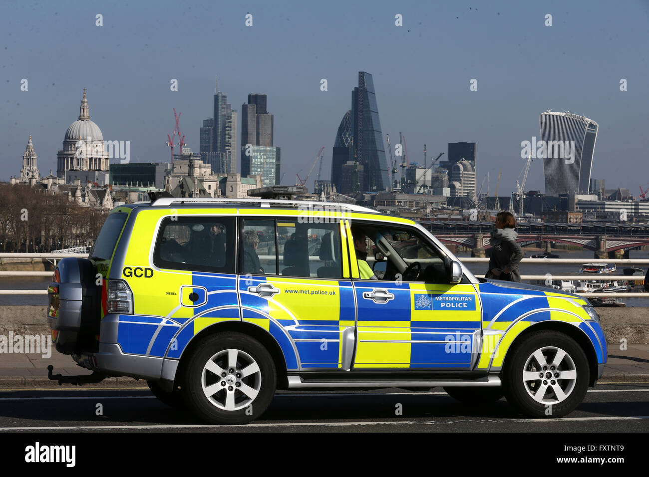 Metropolitan Police patrol over London Bridge with the City of London ...