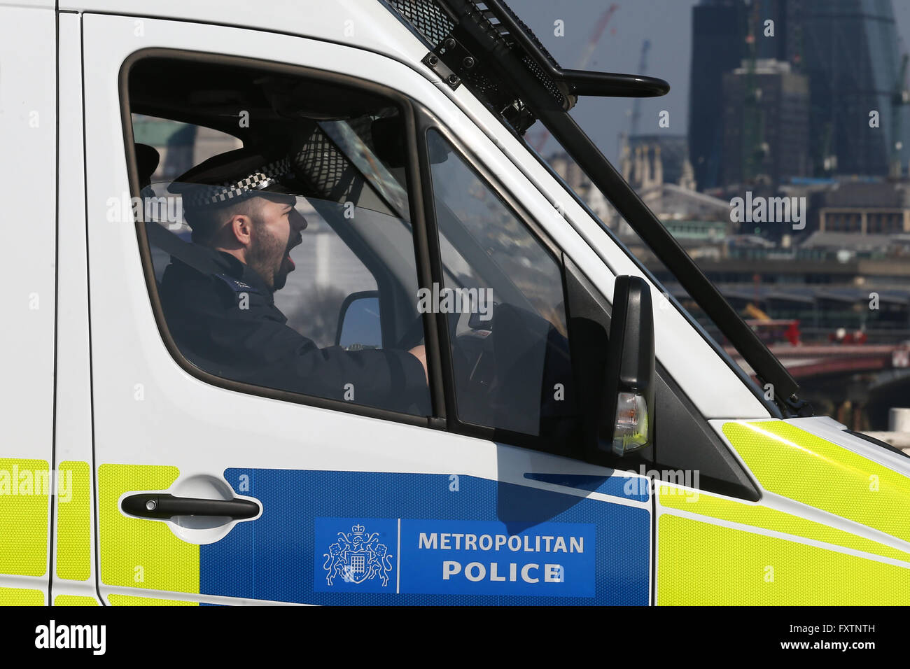 Metropolitan Police patrol over London Bridge with the City of London ...