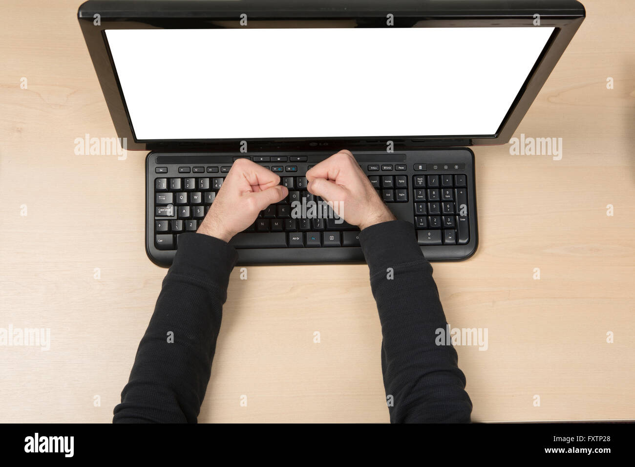 Hitting computer keyboard from above Stock Photo - Alamy