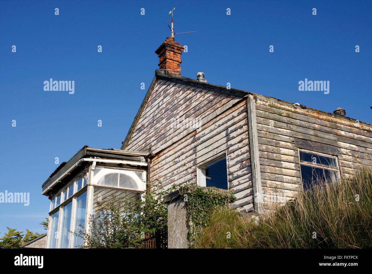Old wooden house on a coastal clifftop Stock Photo - Alamy