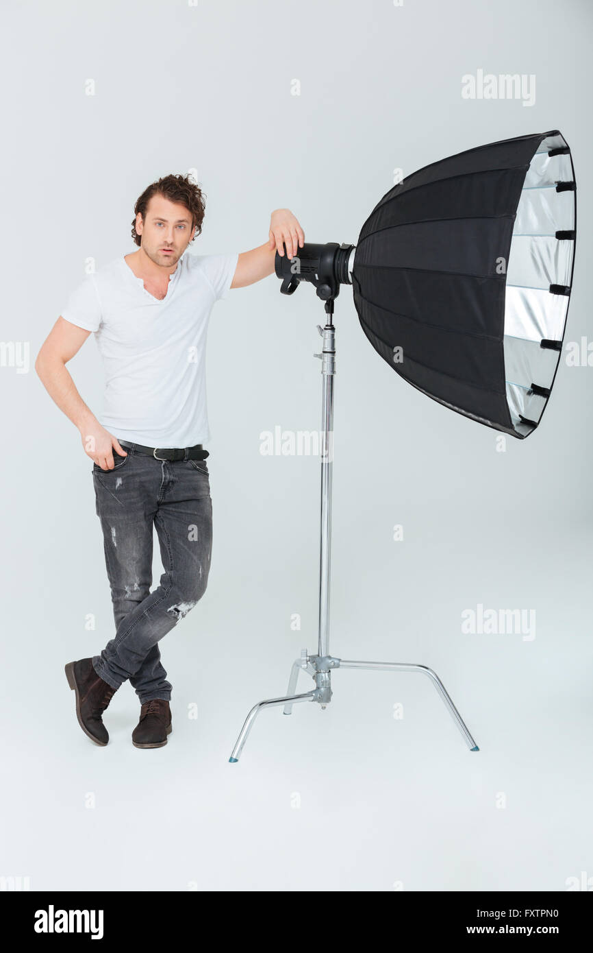 Man fixing a light hi-res stock photography and images - Alamy