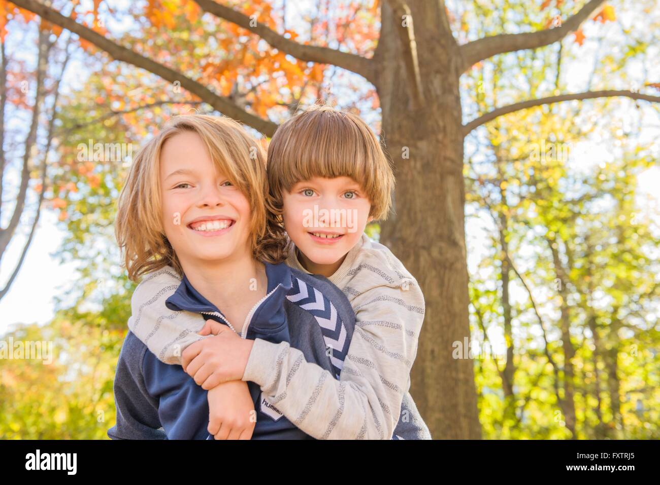 Two brothers hugging hi-res stock photography and images - Alamy