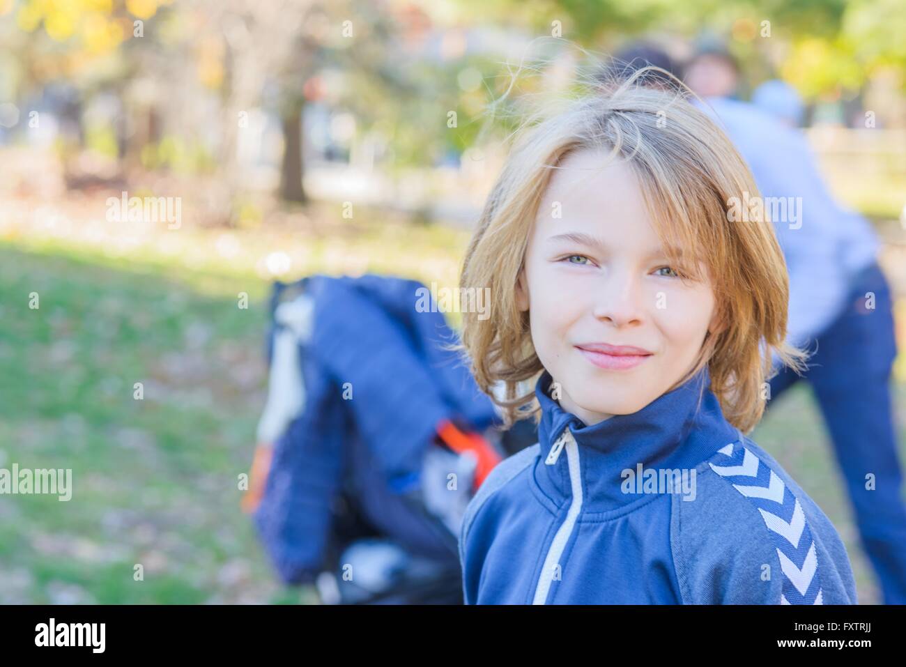Boy portrait smiling outdoors hi-res stock photography and images - Alamy