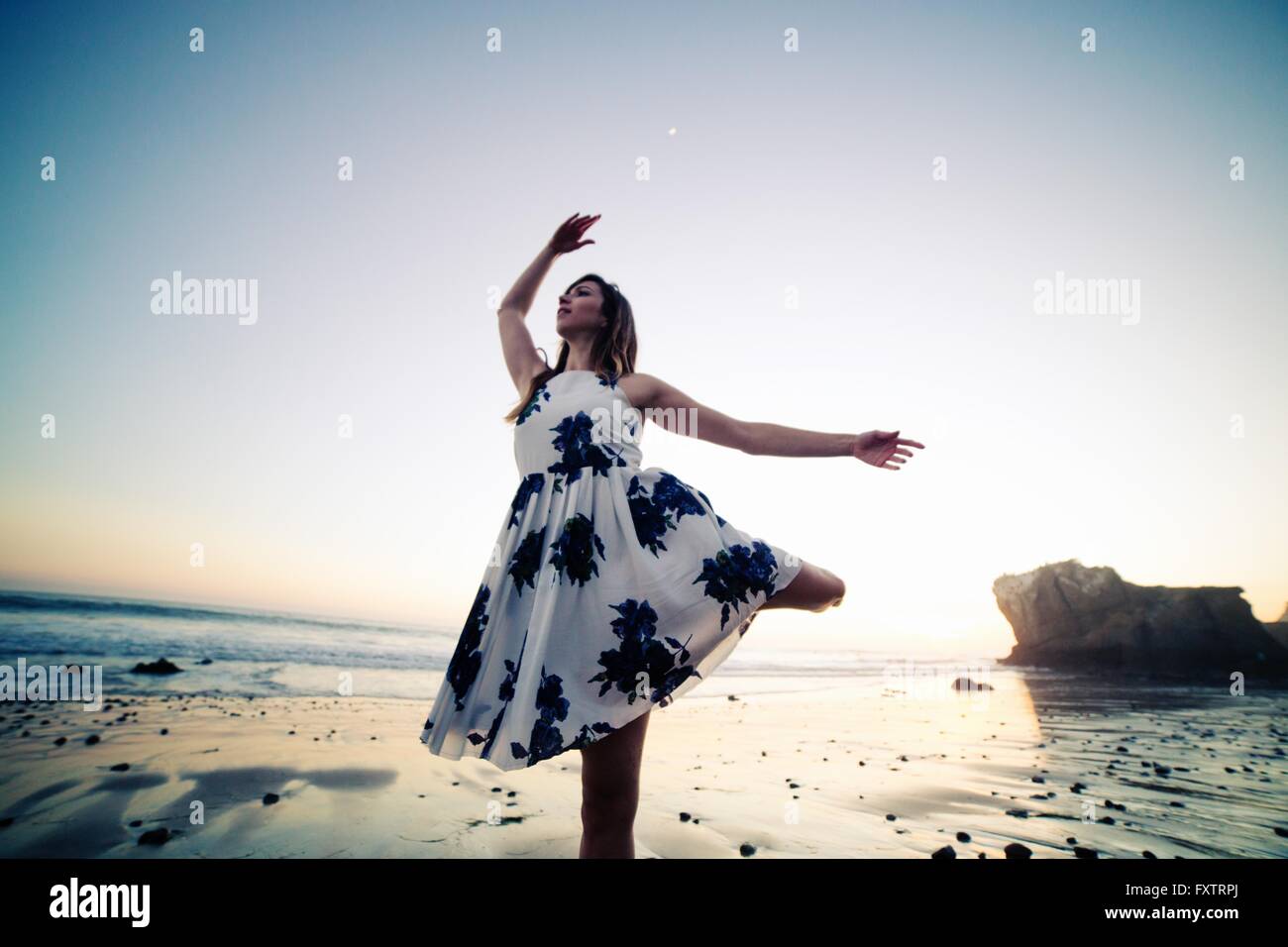 Ballerina dancing on beach Stock Photo - Alamy