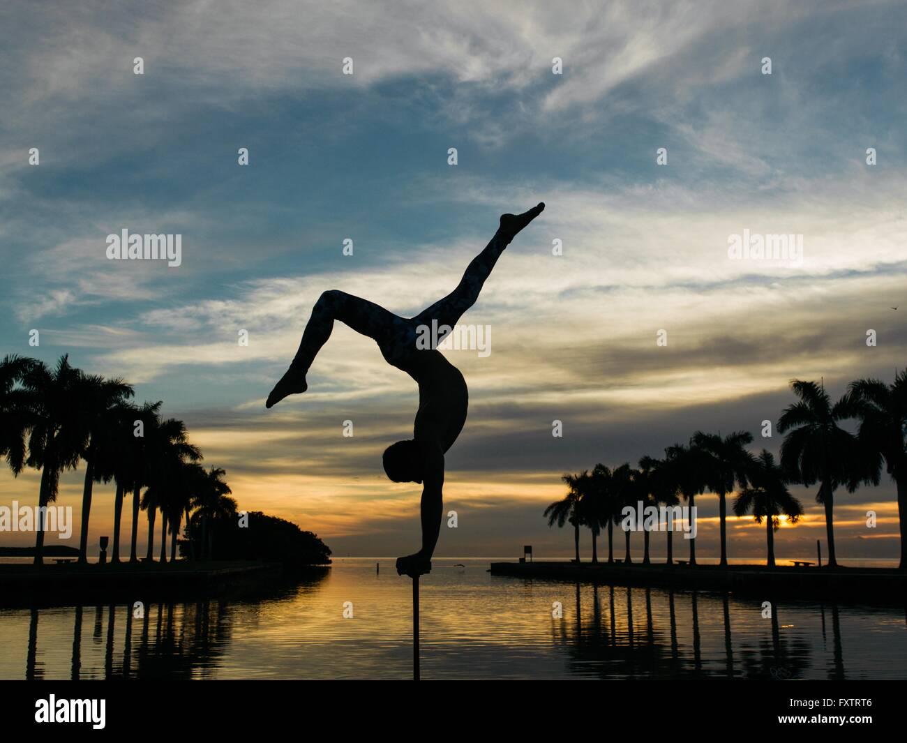 Balancing on pole hi-res stock photography and images - Alamy