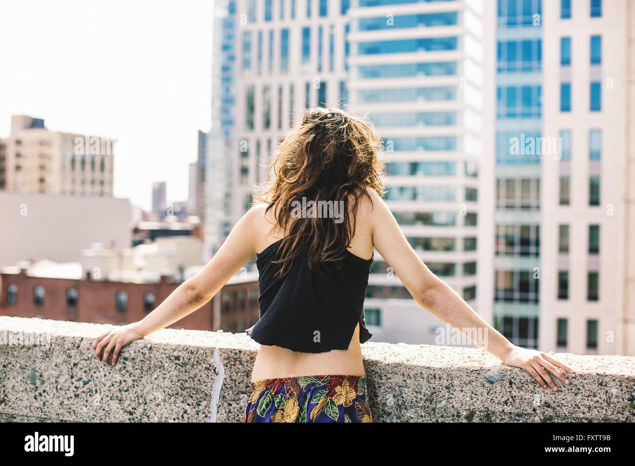 Woman wearing crop top hi-res stock photography and images - Alamy