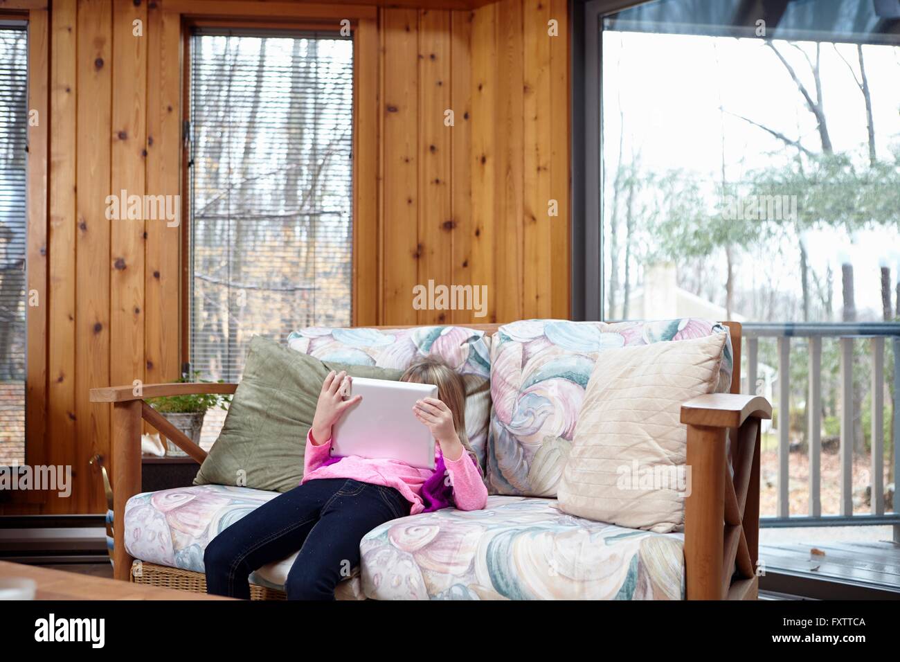 Slouching on the sofa hi-res stock photography and images - Alamy