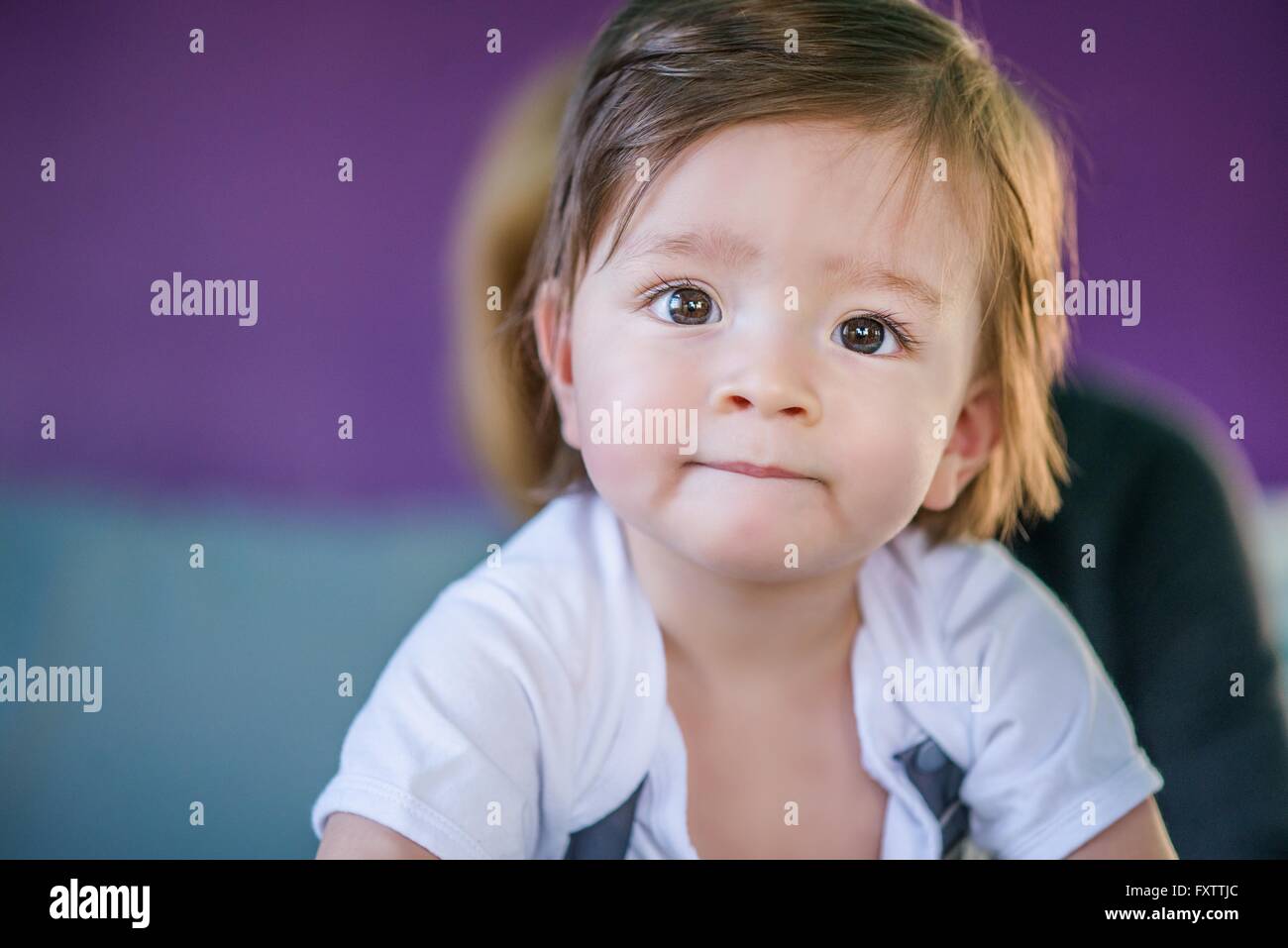 Portrait of baby boy staring Stock Photo - Alamy