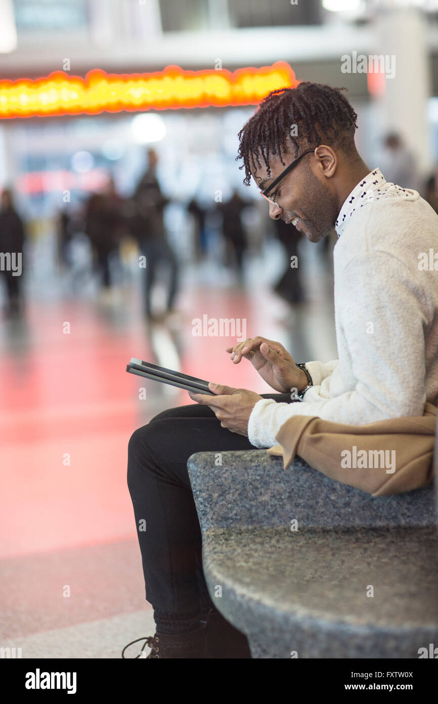 Train reading tablet hi-res stock photography and images - Alamy