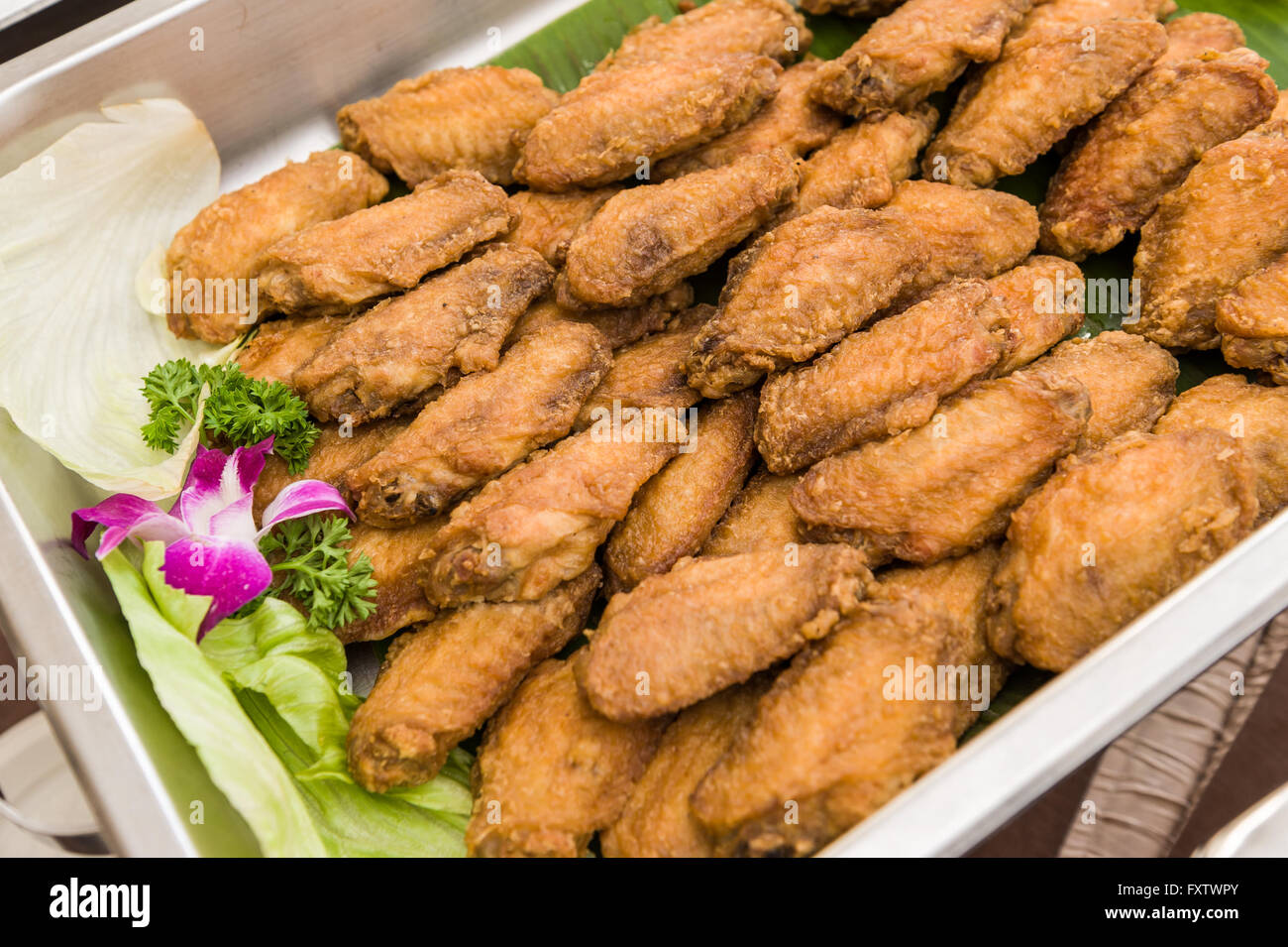 Delicious deep fried chicken wing buffet spread Stock Photo - Alamy
