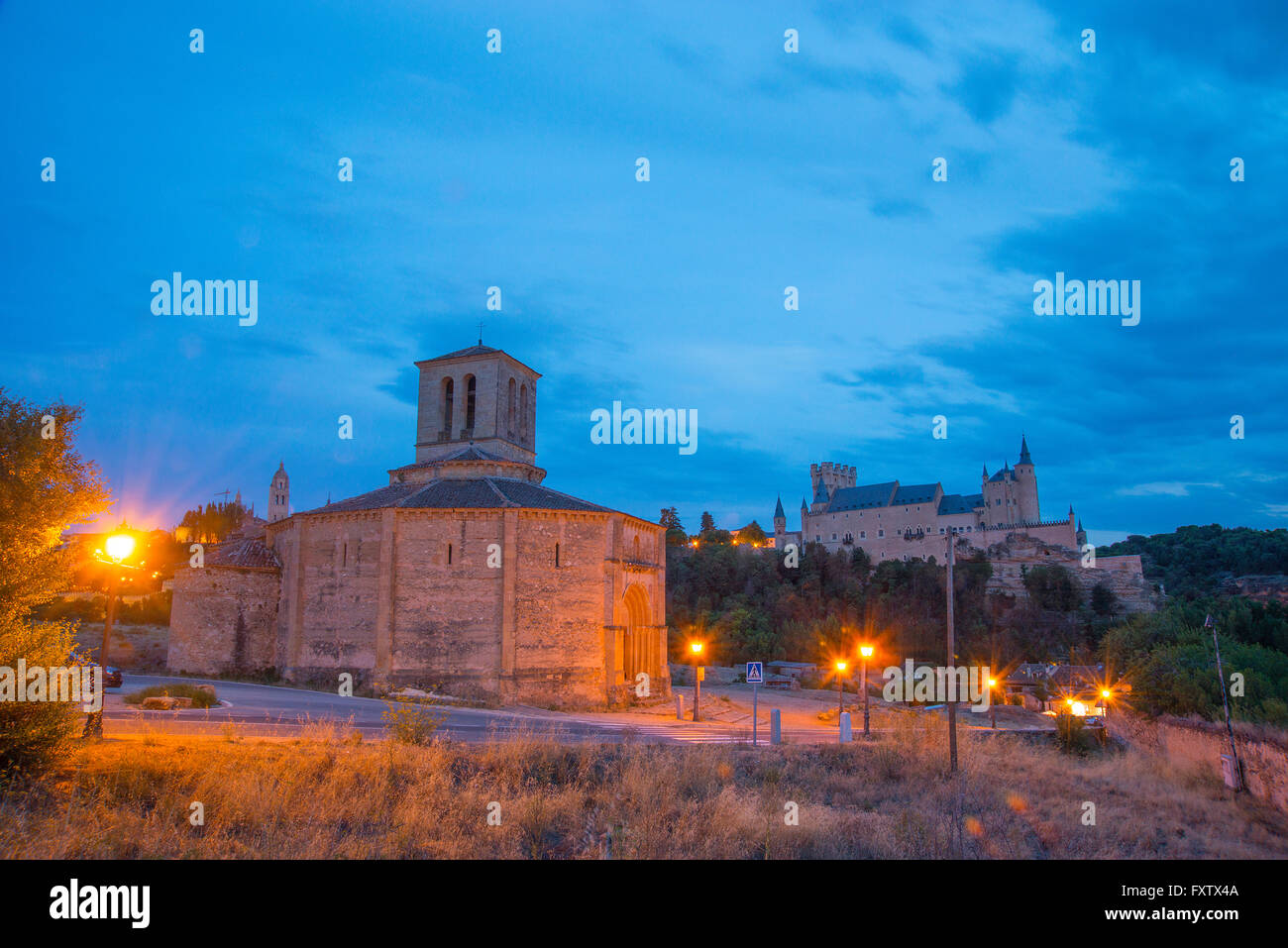 La Vera Cruz church and the Alcazar at nightfall. Segovia, Castilla ...