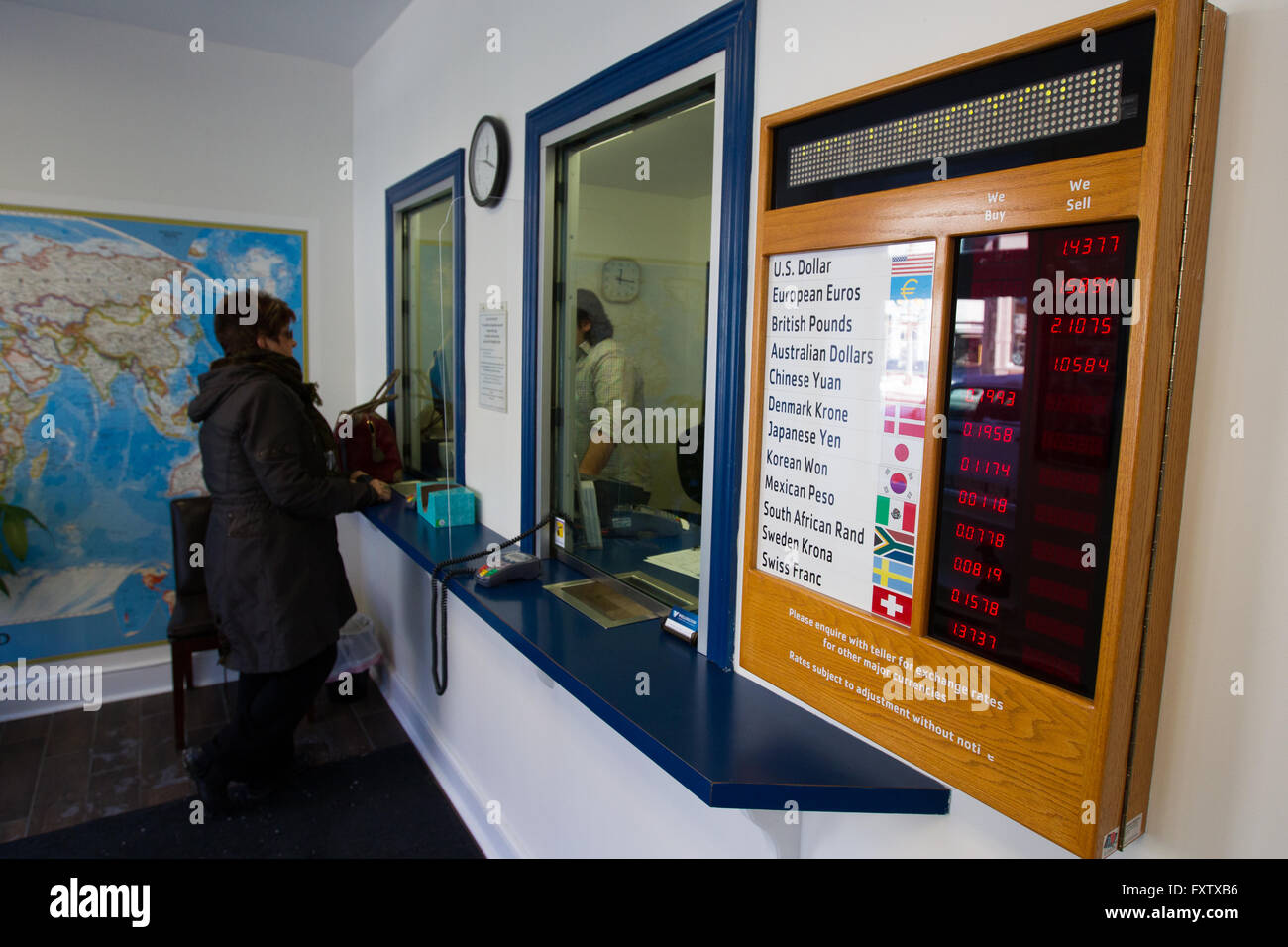 Currency exchange rates woman hi-res stock photography and images - Alamy