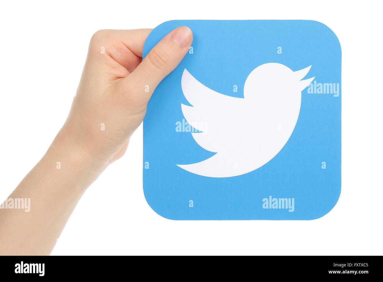 Kiev, Ukraine - January 15, 2016: Hand holds twitter icon printed on ...