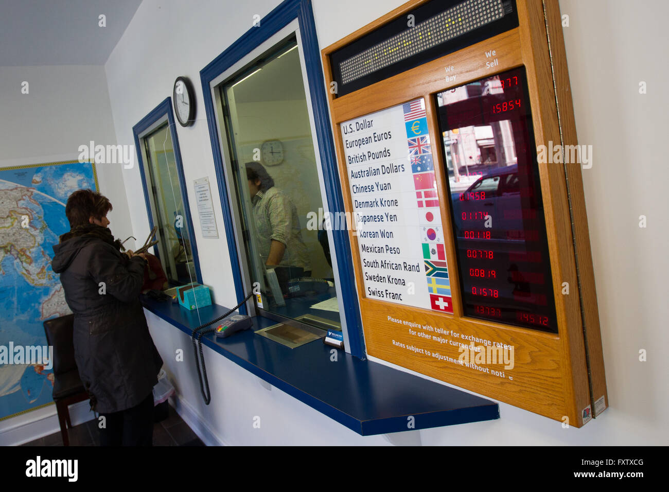 Currency exchange rates woman hi-res stock photography and images - Alamy