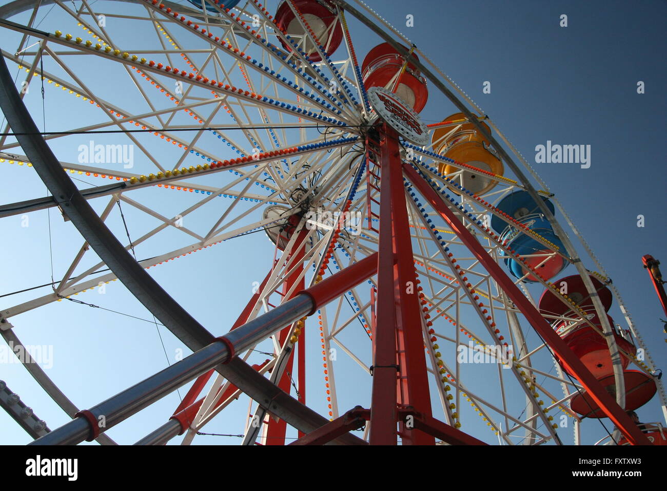 Ferris wheel in the summer blue sky Stock Photo - Alamy
