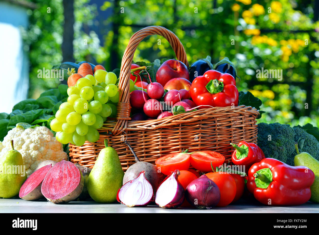Fresh organic vegetables and fruits in the garden. Balanced diet Stock ...