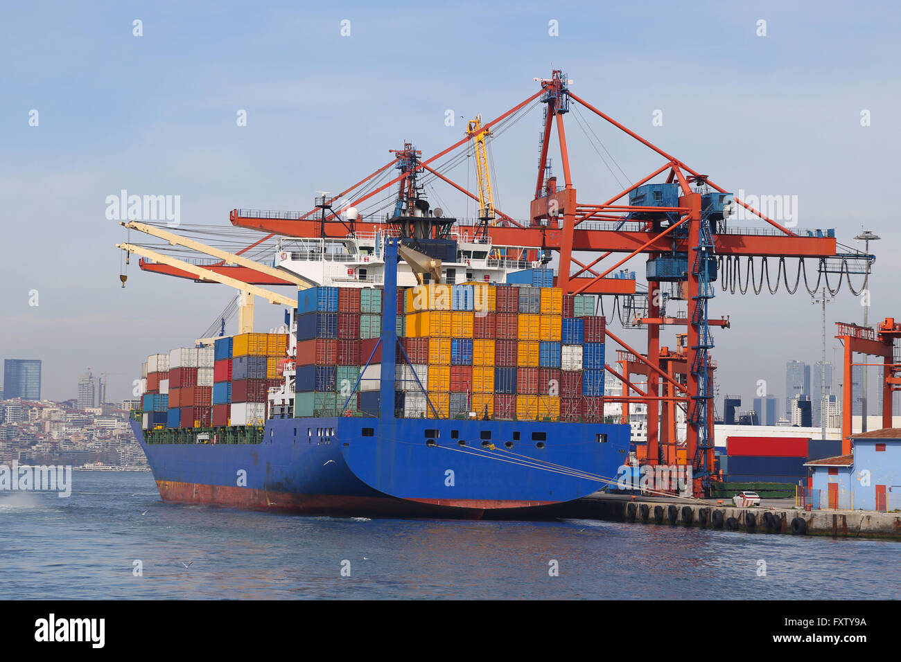Container Ship is loading in a port Stock Photo - Alamy