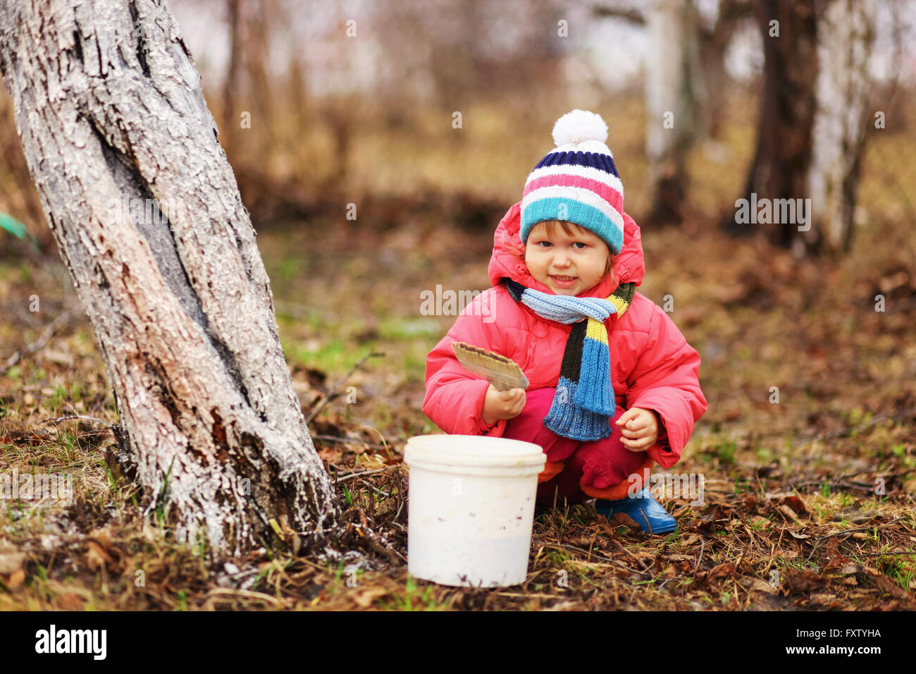 The child in garden happiness outdoors work Stock Photo - Alamy
