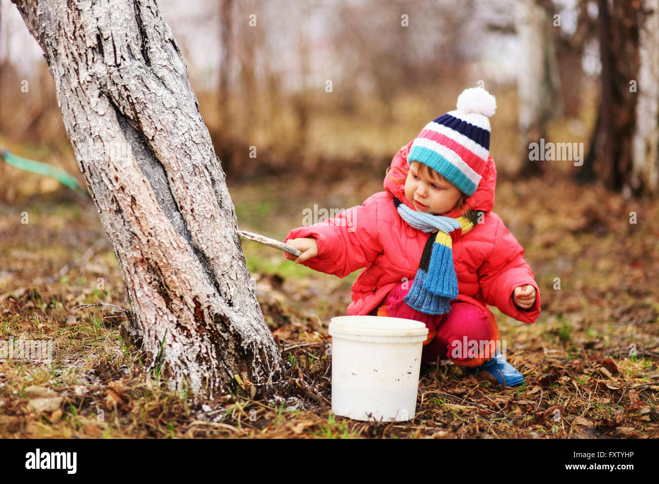 The child in garden happiness outdoors work Stock Photo - Alamy