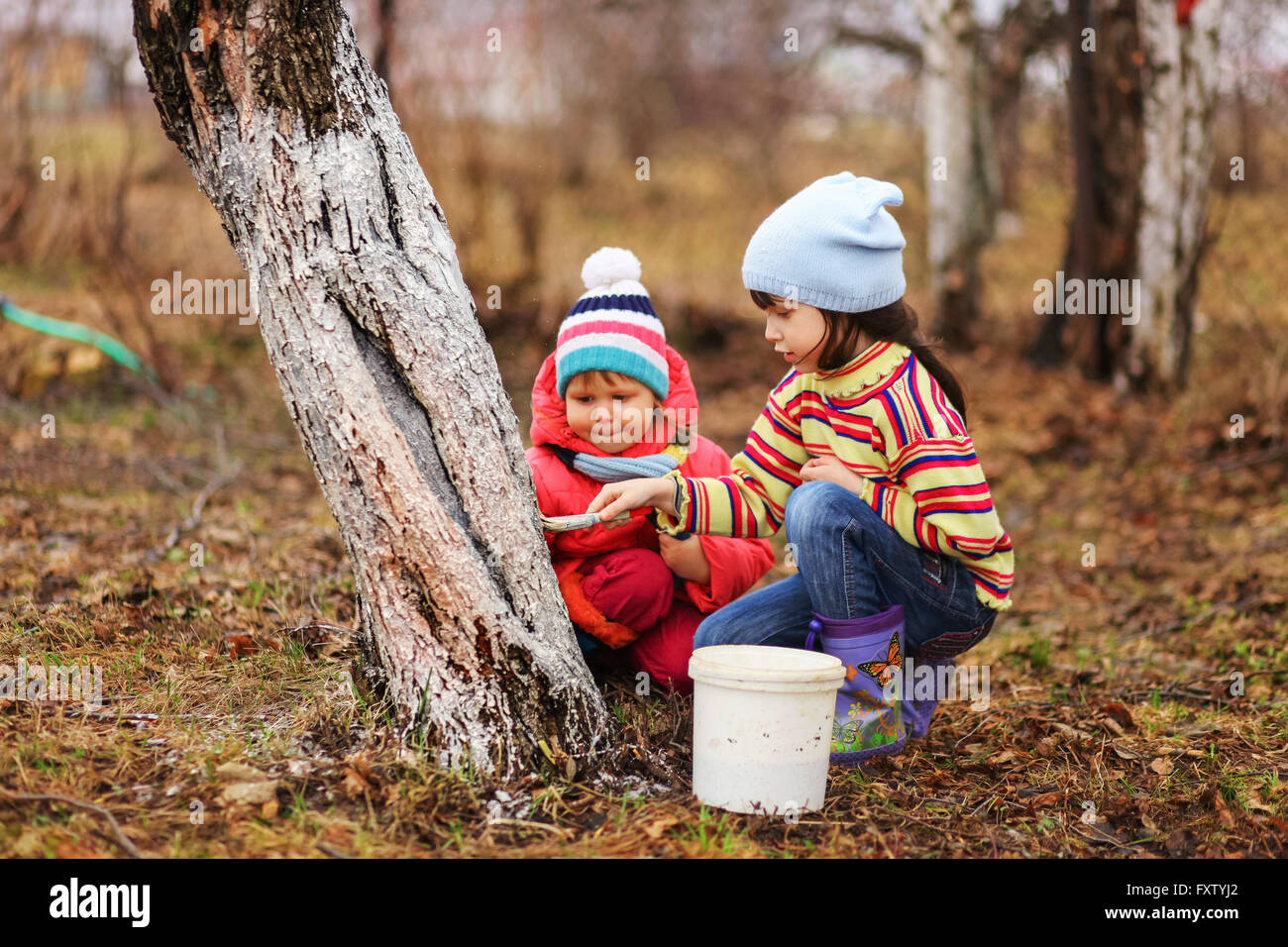 The child in garden happiness outdoors work Stock Photo - Alamy