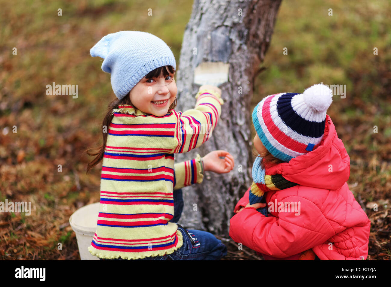 The child in garden happiness outdoors work Stock Photo - Alamy