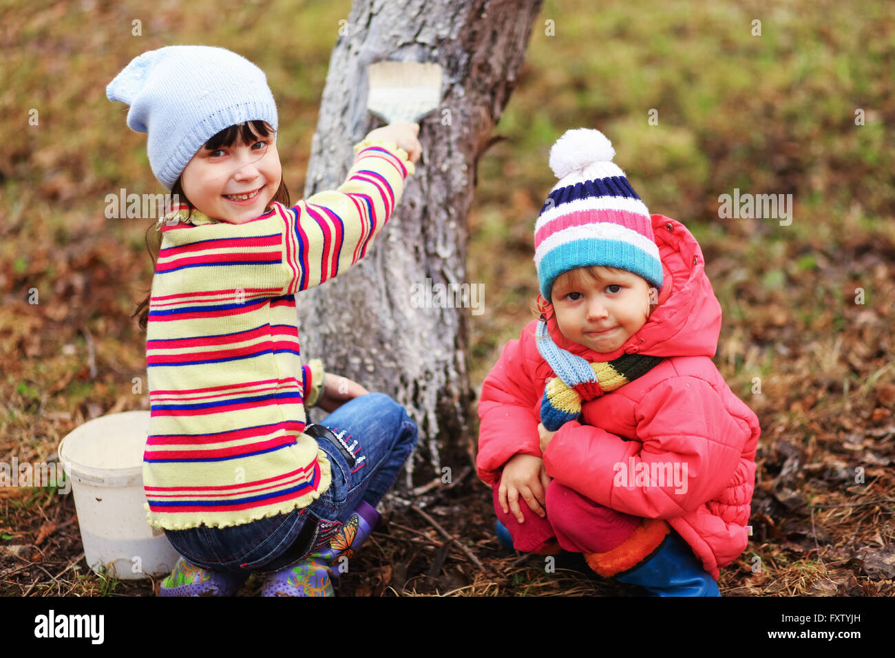 The child in garden happiness outdoors work Stock Photo - Alamy