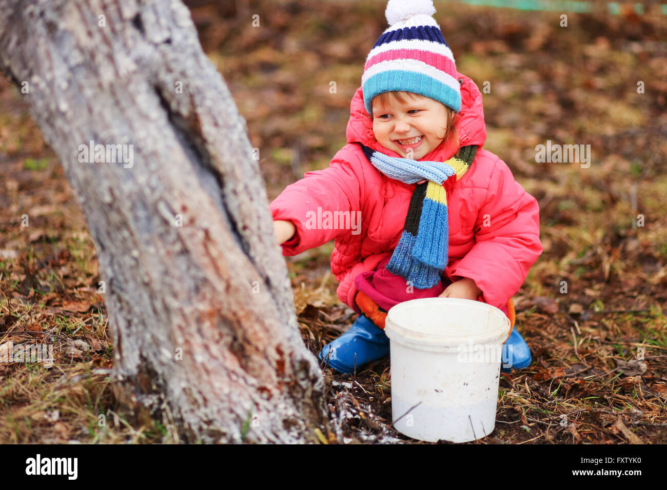 The child in garden happiness outdoors work Stock Photo - Alamy