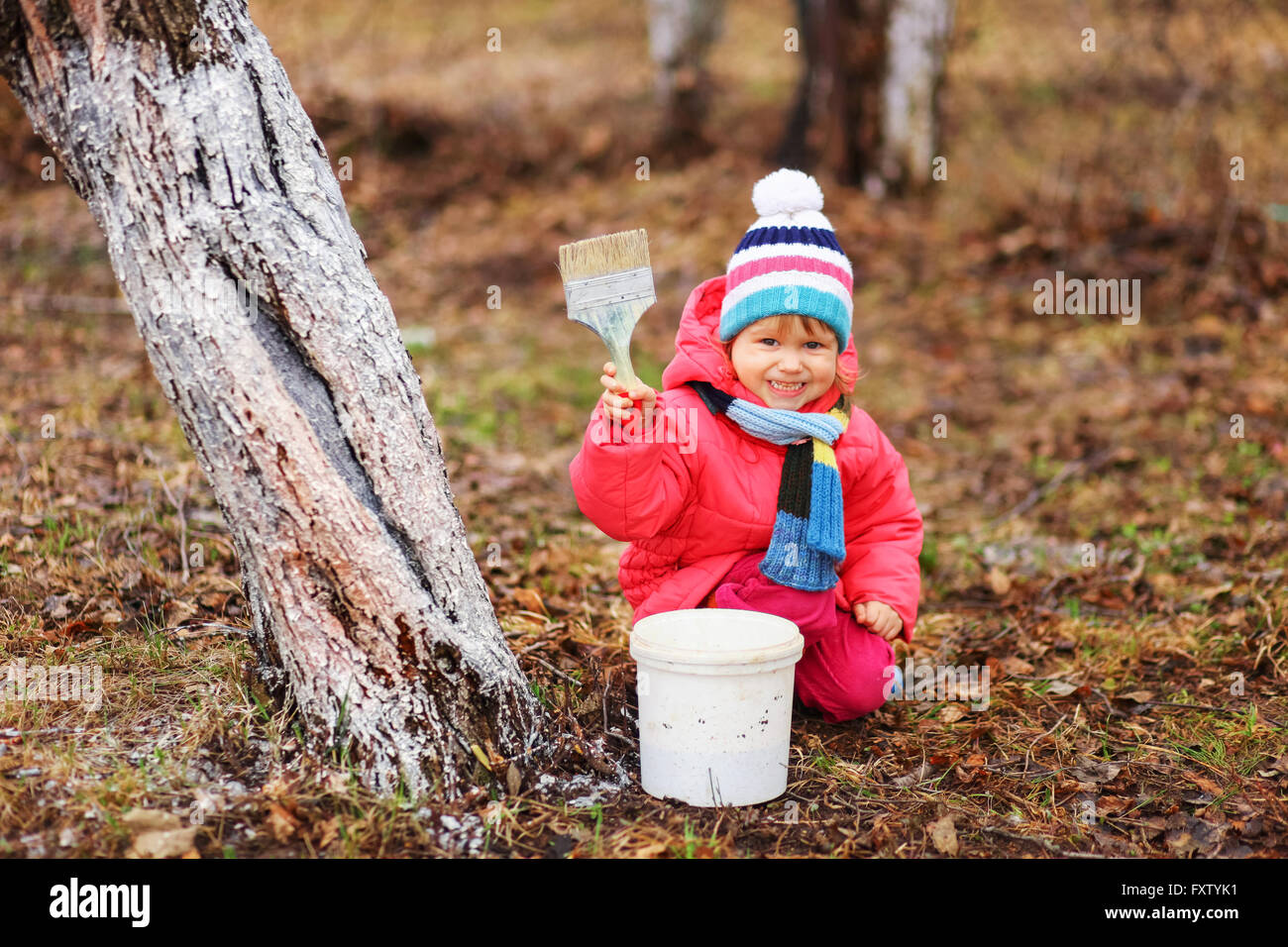 The child in garden happiness outdoors work Stock Photo - Alamy