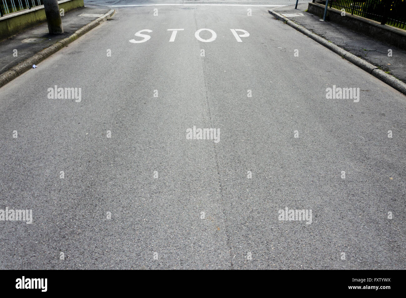Stop sign on asphalt hi-res stock photography and images - Alamy