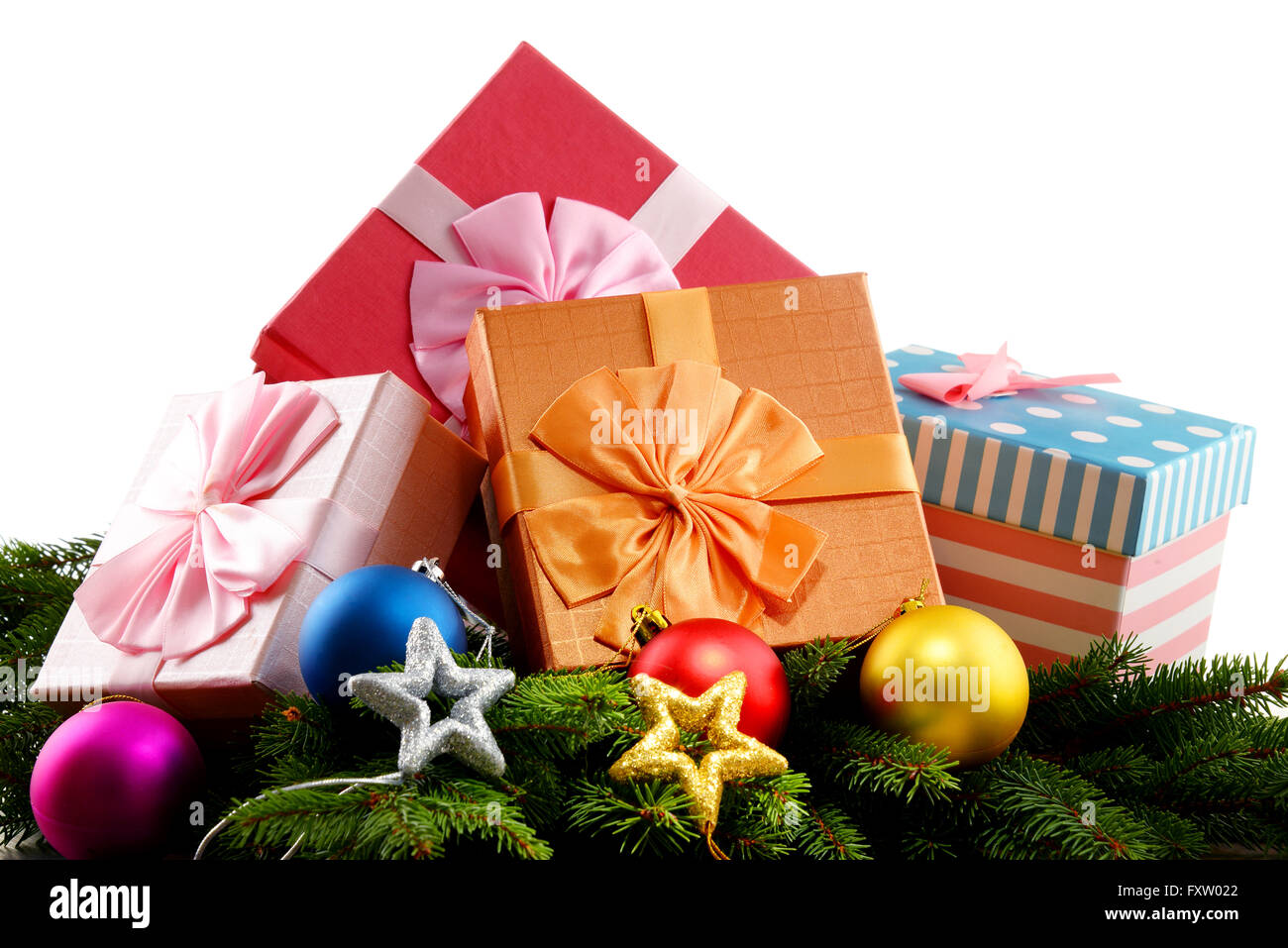 Colorful gift boxes and christmas tree isolated on white Stock Photo ...